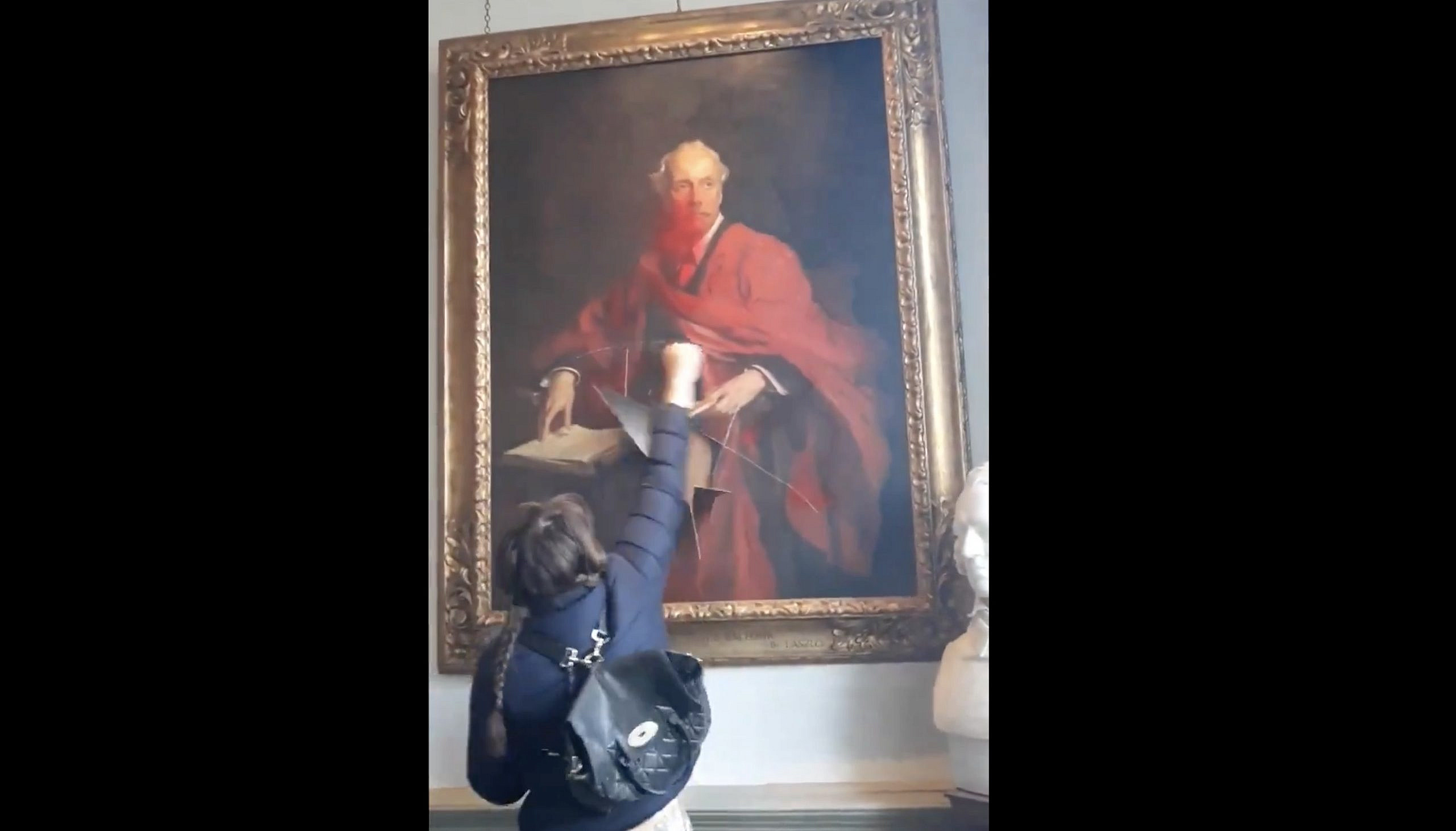 Anti-Israel protester destroys painting of Lord Balfour, who paved way ...